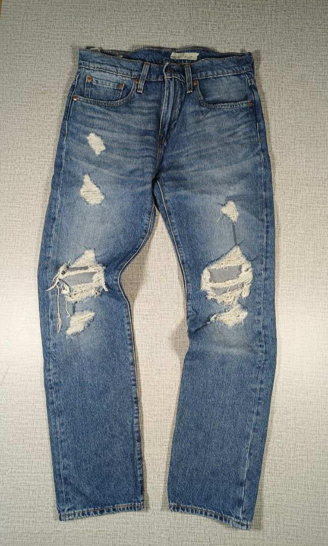 LEVI S 502 Big E Ripped Jeans Men s Fashion Bottoms Jeans on Carousell