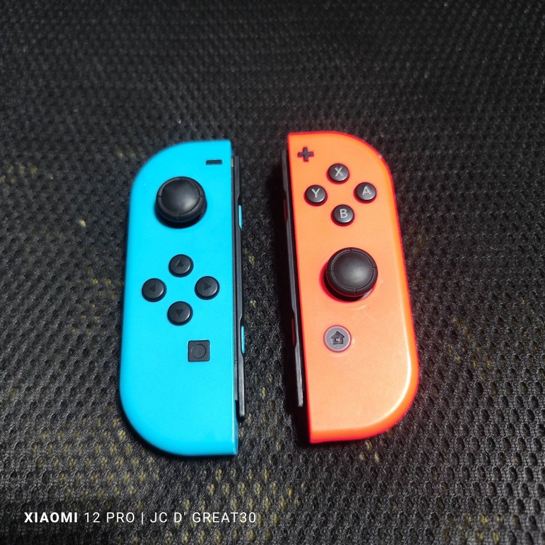 Nintendo Switch joycon Neon red and blue, Video Gaming, Gaming ...