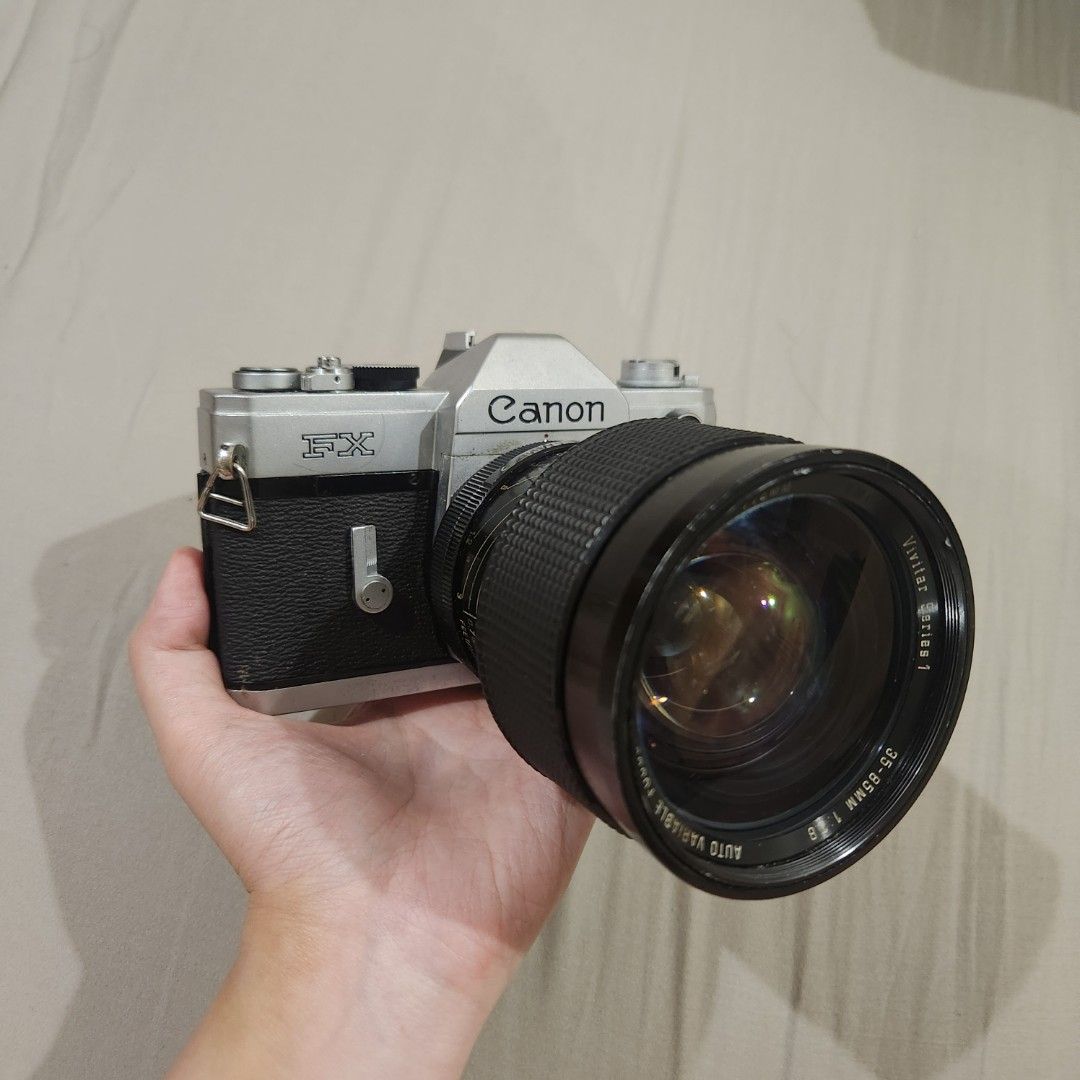 Canon FX film camera body + Vivitar Series 1 35-85mm f2.8 lens ...