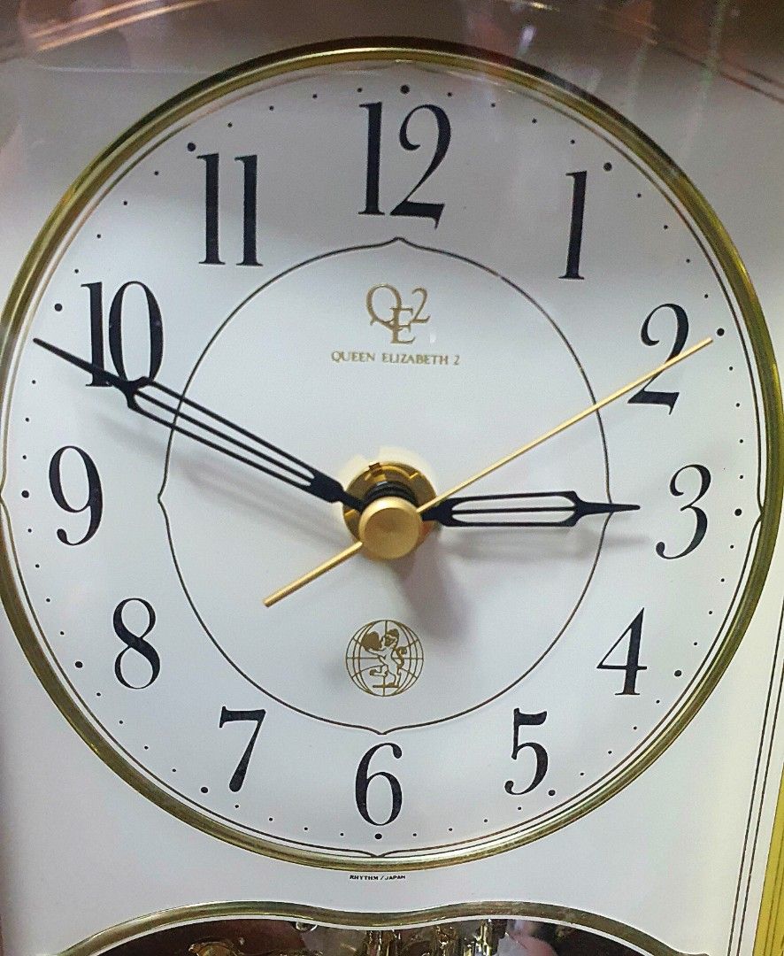 Queen Elizabeth 2 Quartz Clock Clock is working condition but the music ...