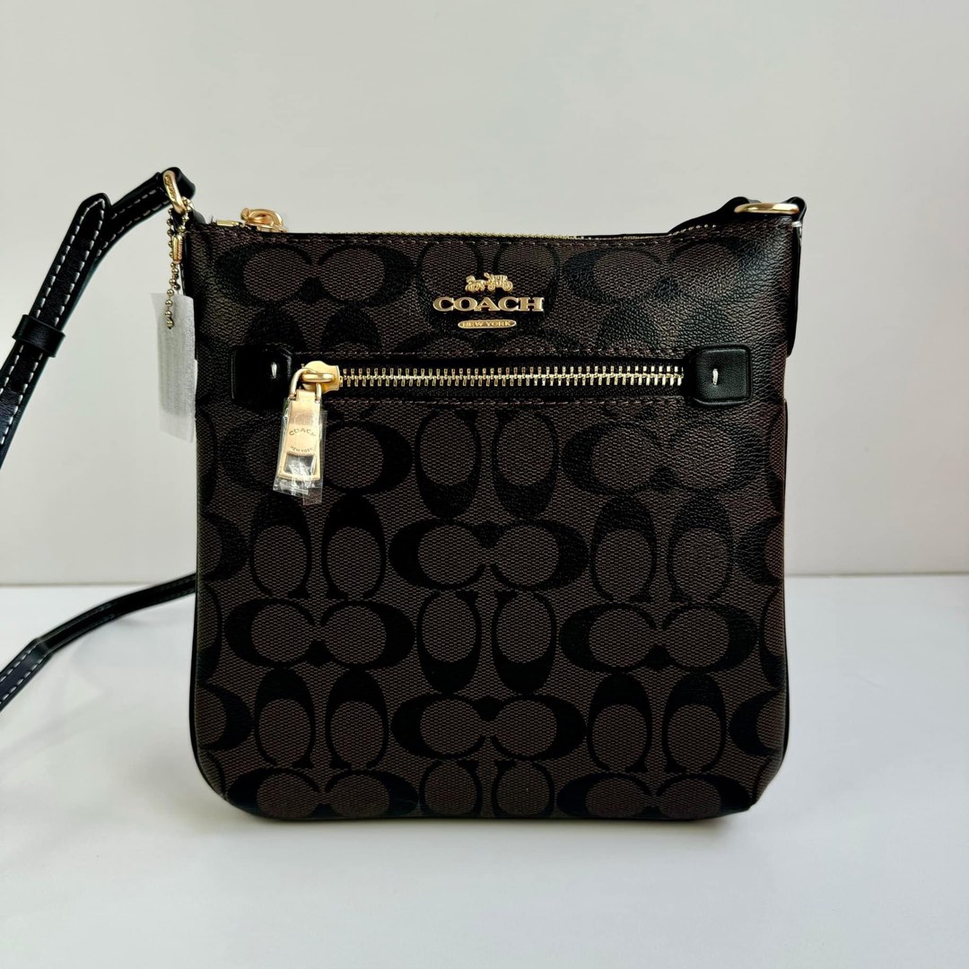 MINI ROWAN FILE BAG IN SIGNATURE CANVAS, Women's Fashion, Bags ...