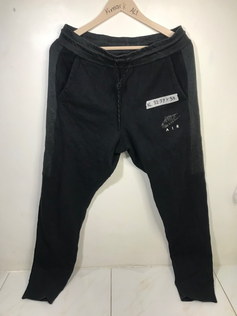 Nike red tag jogger, Men's Fashion, Bottoms, Joggers on Carousell