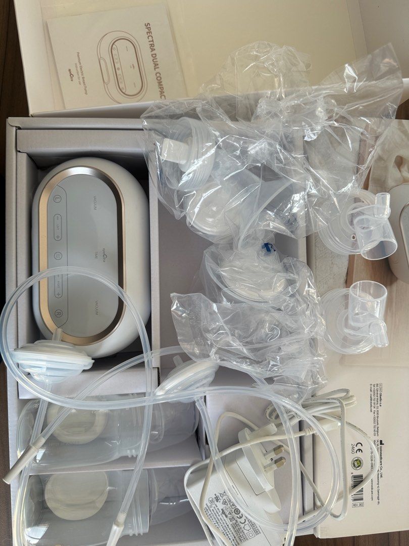 Spectra dual compact breast pump used for 1 month only with warranty ...