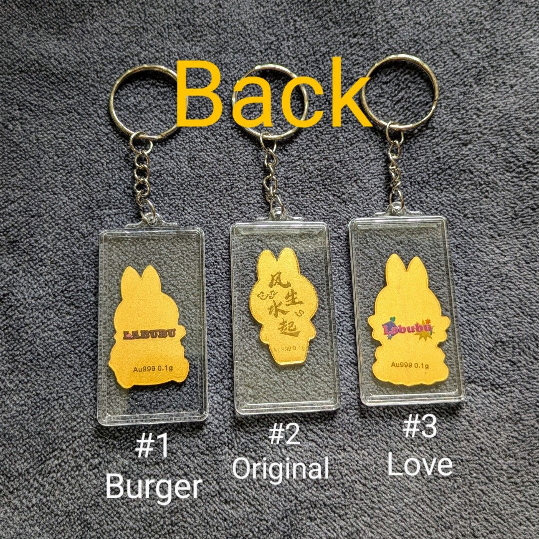 Gold Labubu 拉布布 keychain on Carousell
