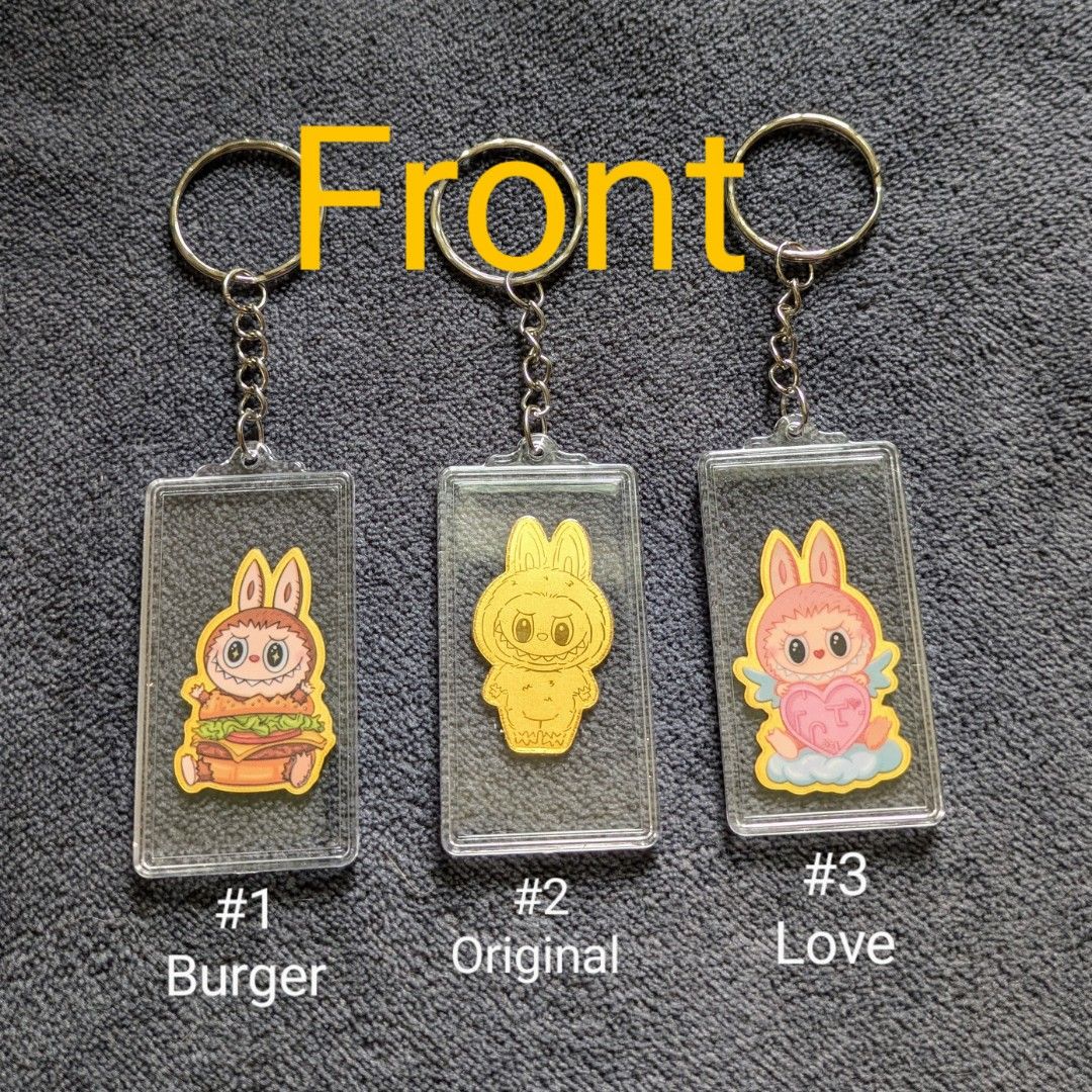 Gold Labubu 拉布布 keychain on Carousell