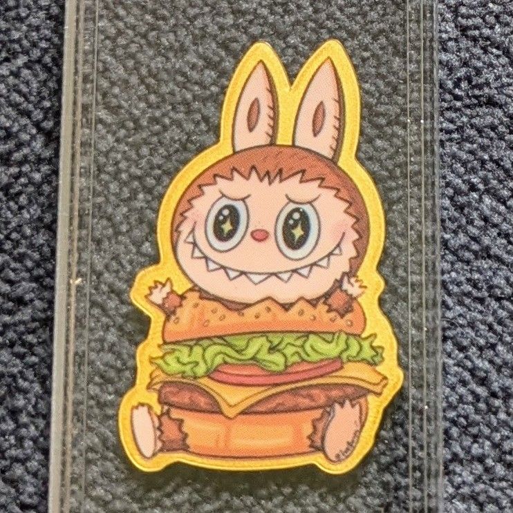 Gold Labubu 拉布布 keychain on Carousell
