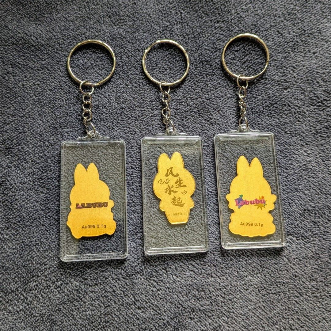 Gold Labubu 拉布布 keychain on Carousell