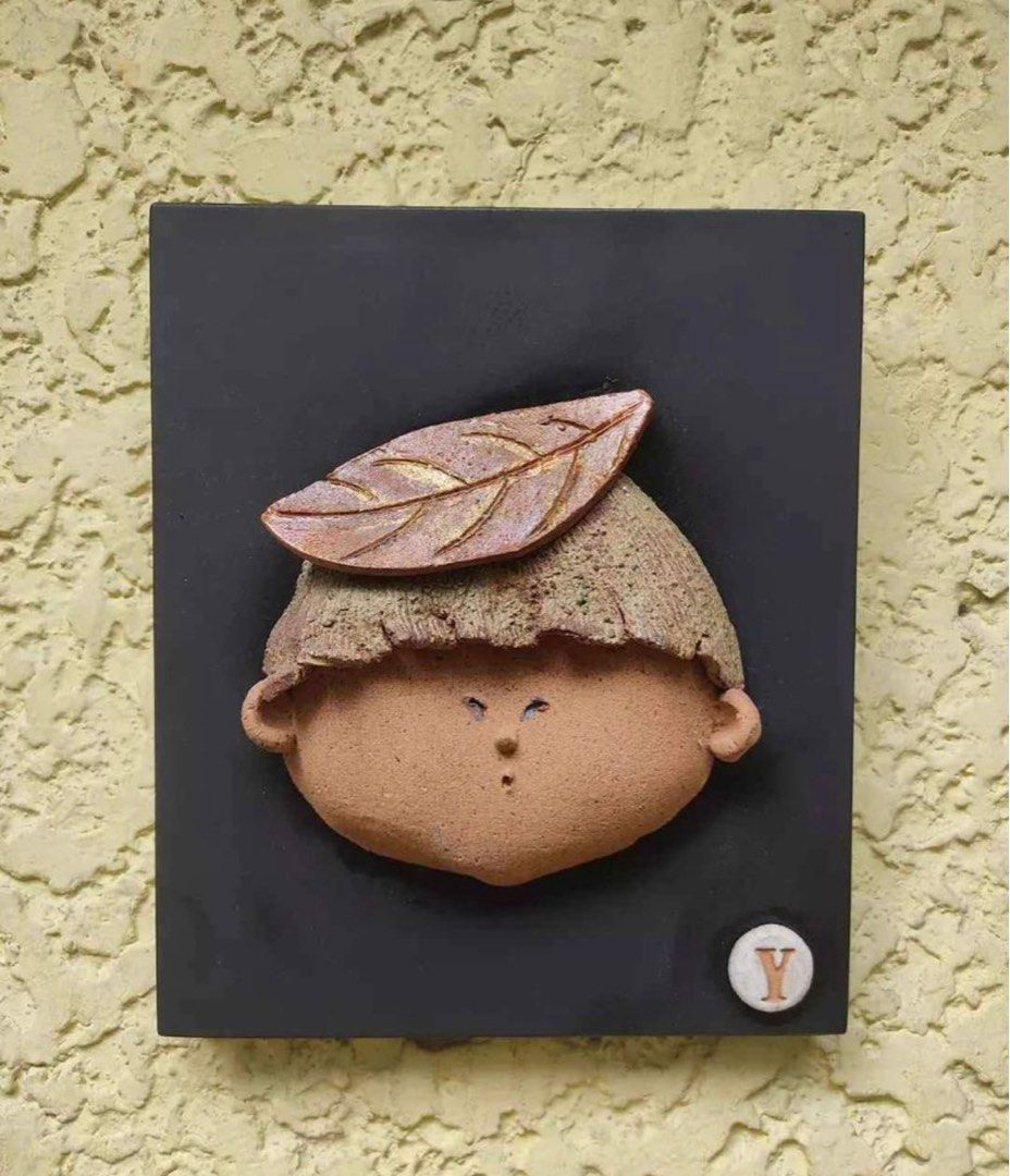 Stoneware little boy wall display, Furniture & Home Living, Home Decor ...