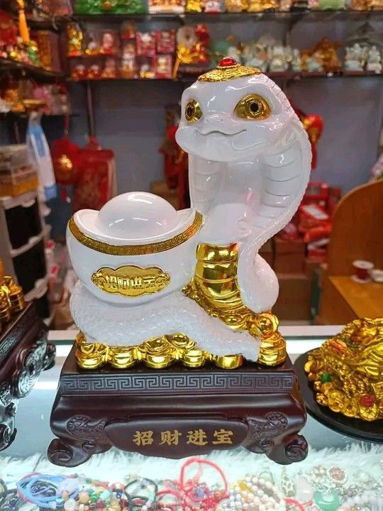 Lucky snake hold money bar/money bag display, Furniture & Home Living ...