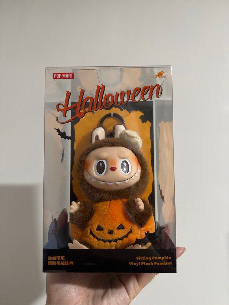 Labubu Sitting Pumkin, Hobbies & Toys, Toys & Games on Carousell