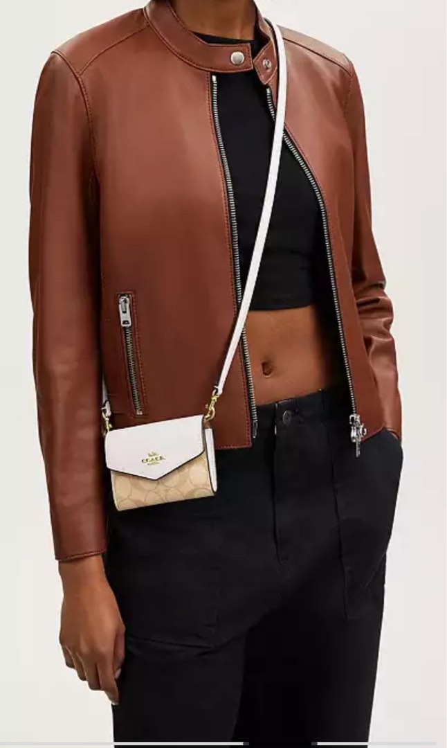 Coach mini envelope wallet with strap, Luxury, Bags & Wallets on Carousell