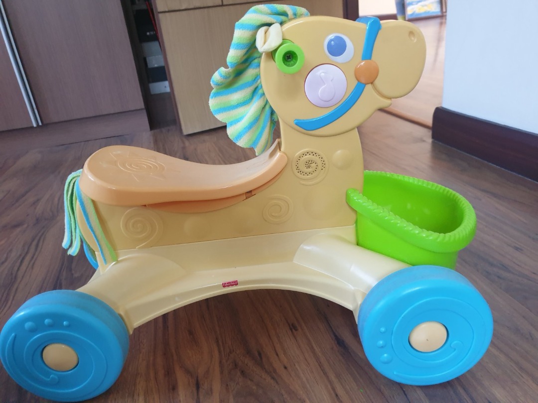 Fisher-Price Roll-Along Musical Pony Ride-On Toy Pink Horse Brilliant ...