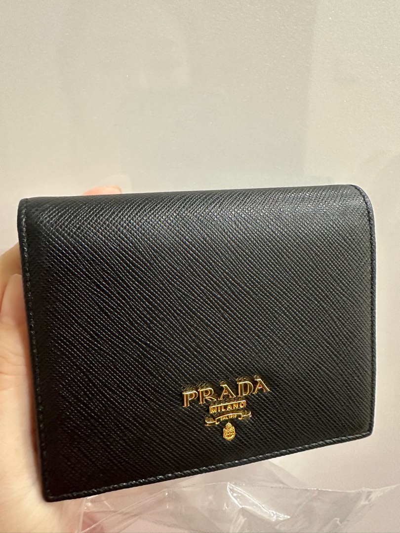 Authentic Prada compact short wallet, Luxury, Bags & Wallets on Carousell