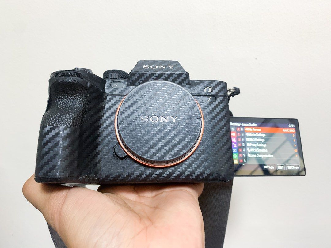 Sony A7IV with Carbon Fiber Skin plus Peak Design Slide Lite wide strap ...