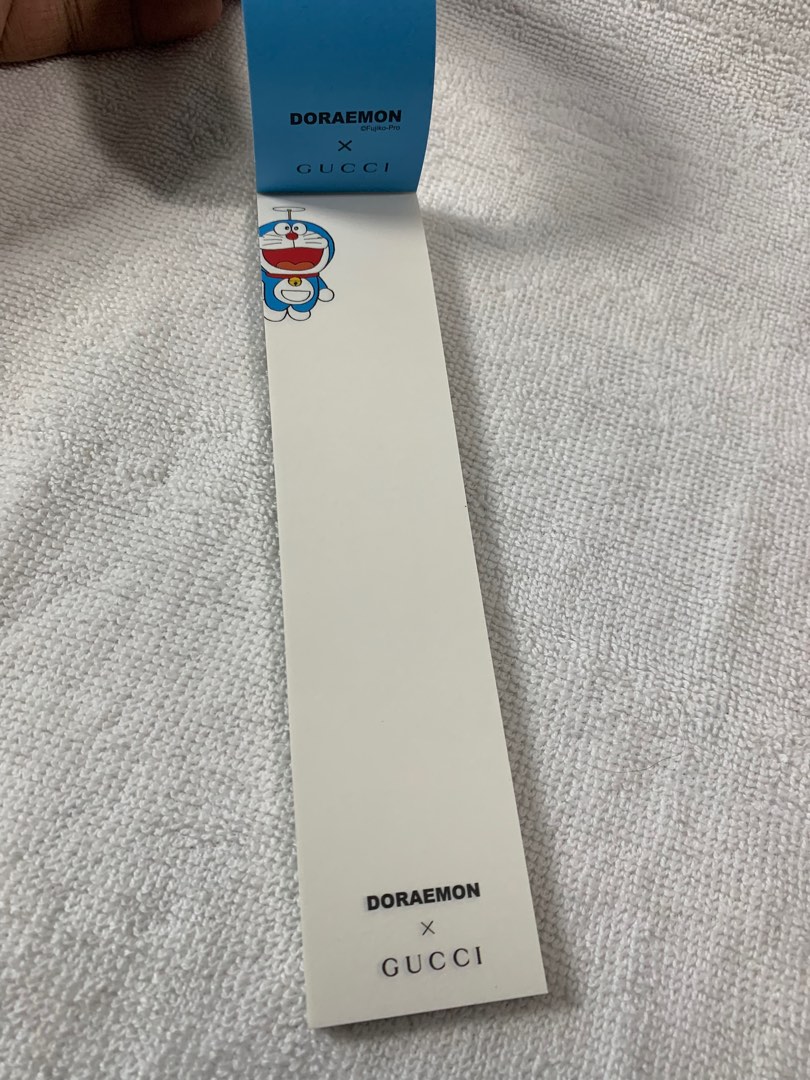 Gucci x Doraemon note pad, Luxury, Apparel on Carousell
