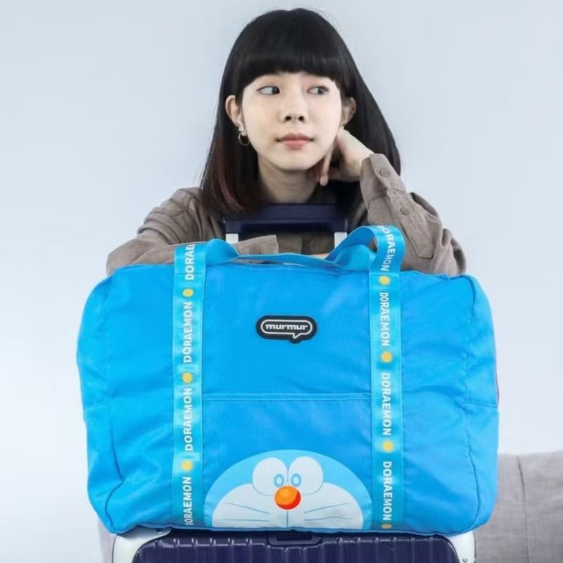 日本 Fujiko Pro 叮噹 Doraemon x murmur 台灣限定 藍色尼龍布 可摺疊 手挽 旅行袋, 興趣及遊戲, 旅行, 旅遊 ...
