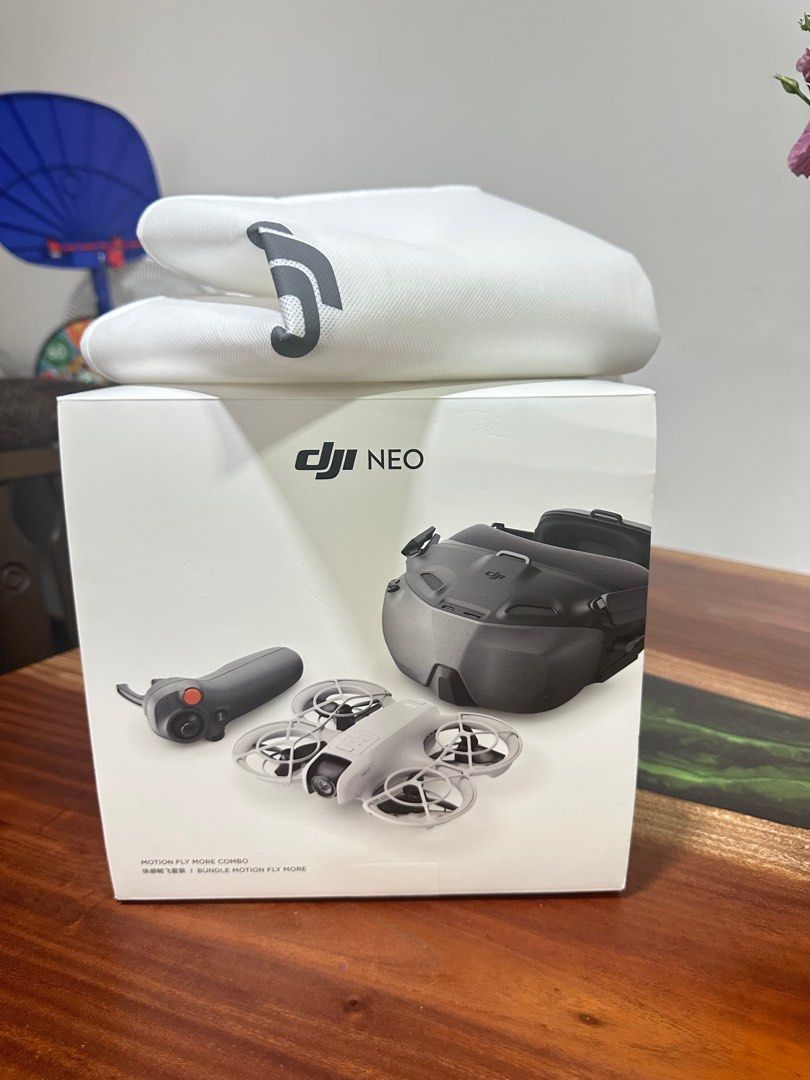 DJI NEO MOTION FMC, Photography, Drones on Carousell