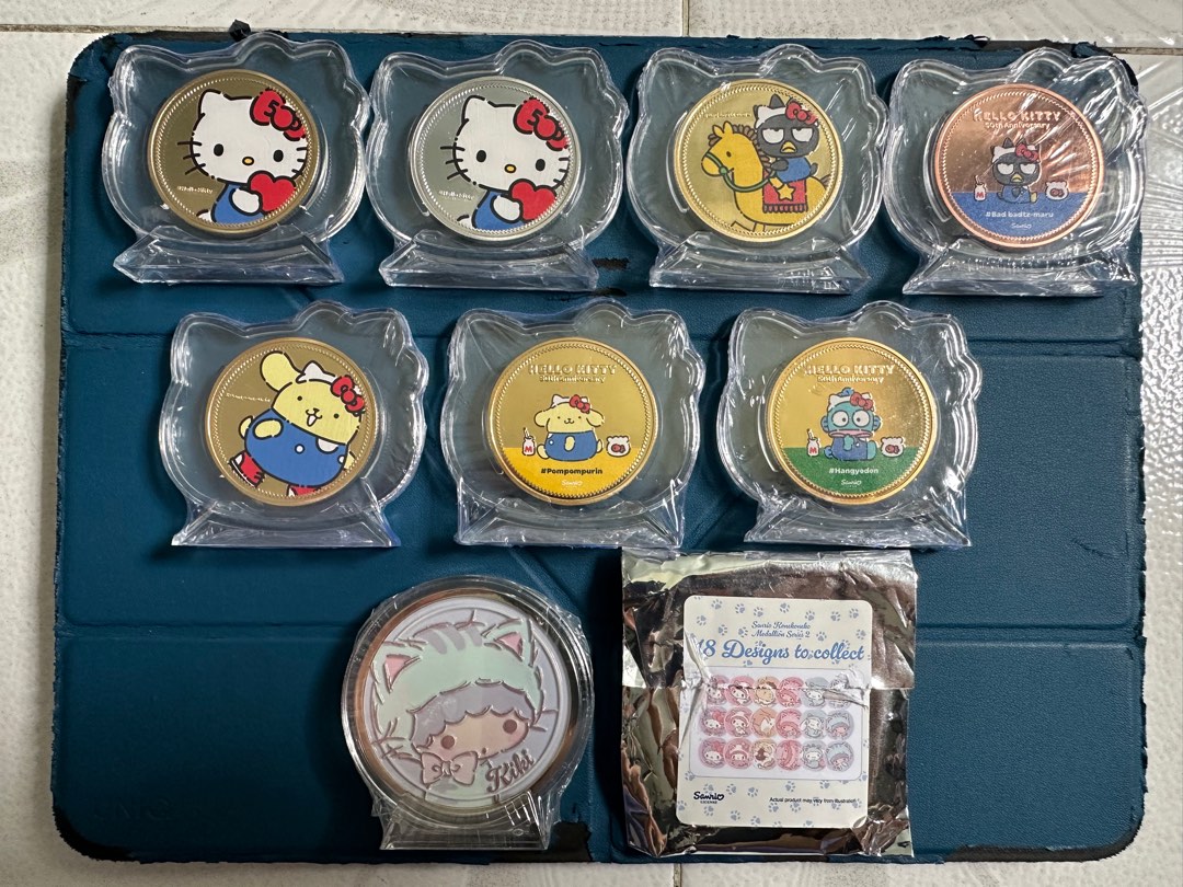 Hello Kitty 50th Anniversary The Singapore Mint Coin/Medallion, Hobbies ...