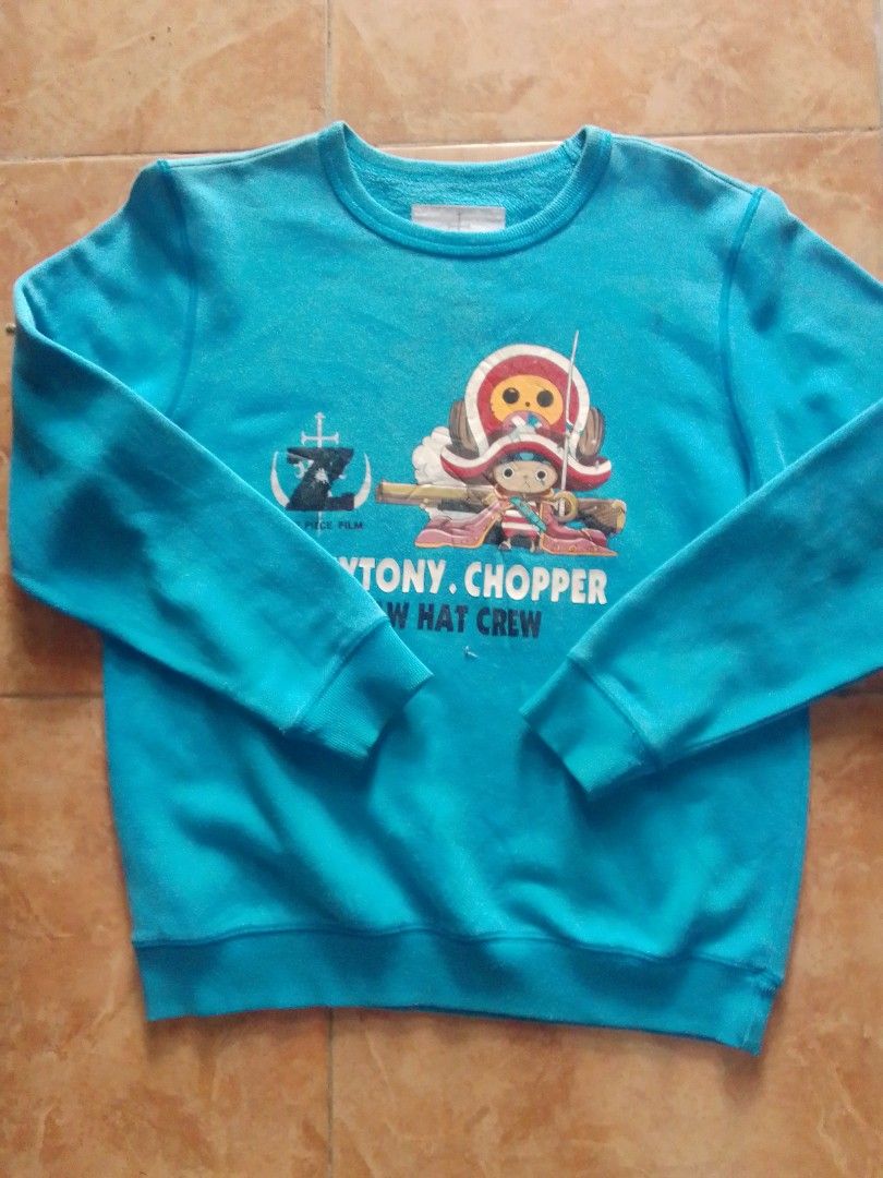 Switer one piece film biru, Fesyen Pria, Pakaian , Atasan di Carousell