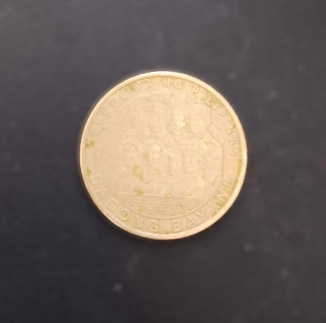 The Bagong Bayani ₱5 coin was issued to honor Overseas Filipino Workers ...