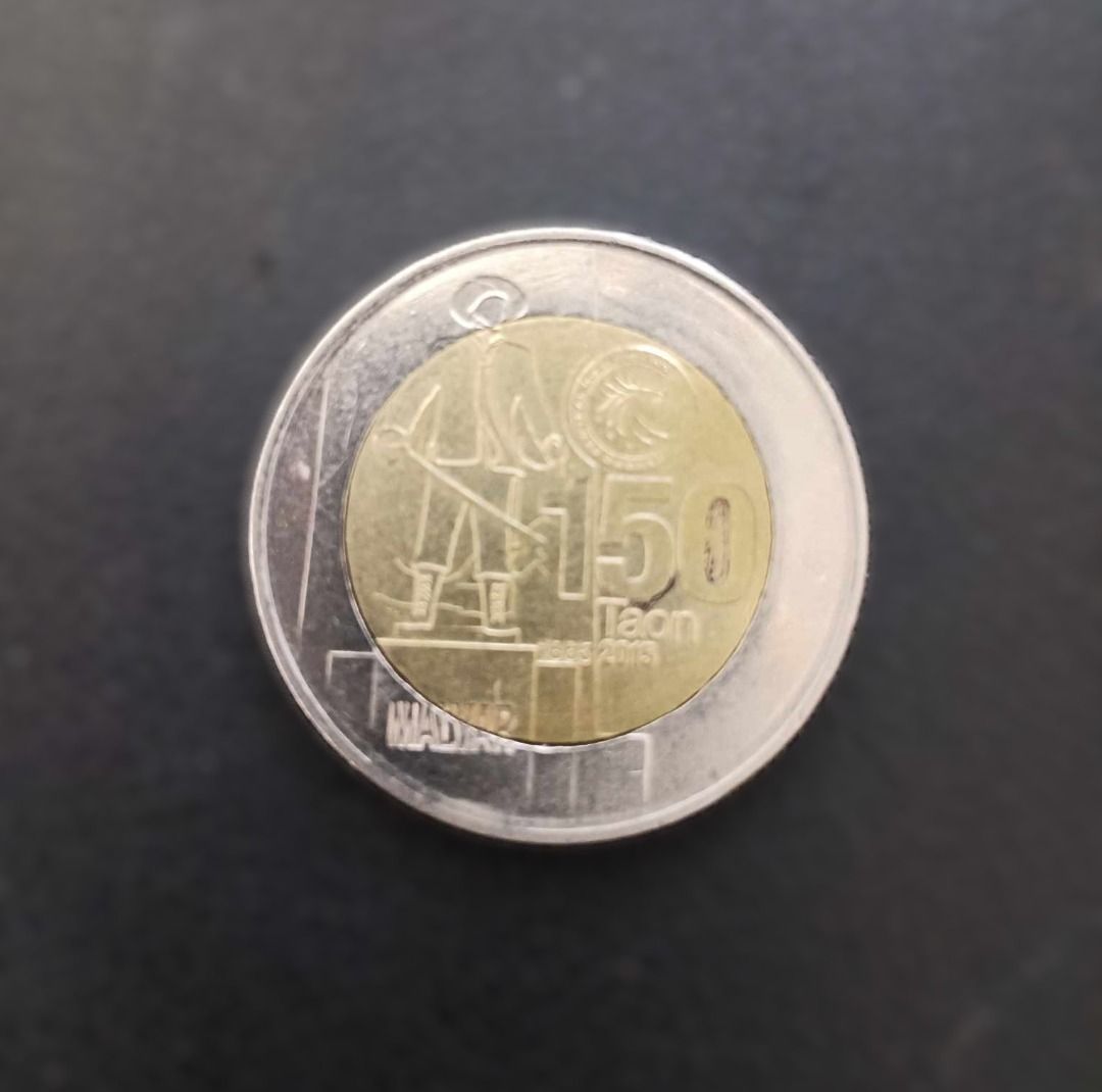 The Bagong Bayani ₱5 coin was issued to honor Overseas Filipino Workers ...