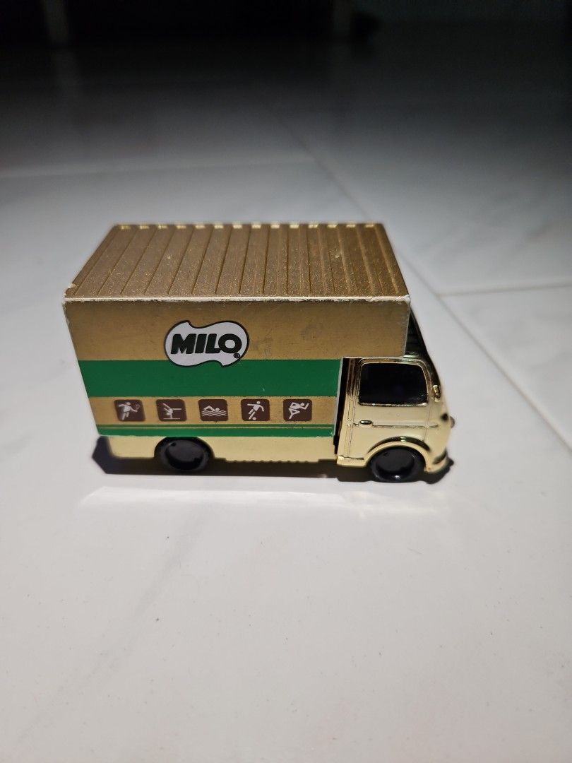 Vintage Gold Milo Van, Hobbies & Toys, Toys & Games on Carousell
