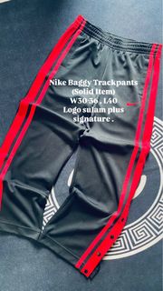 Nike side button pants baggy, Men's Fashion, Activewear on Carousell