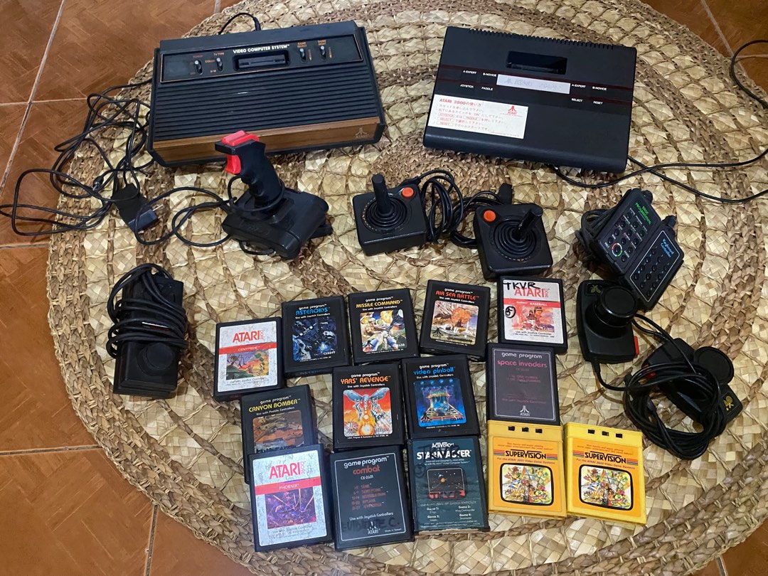 The Atari 2600 and Rare Japanese Atari 2800 with games and controllers ...