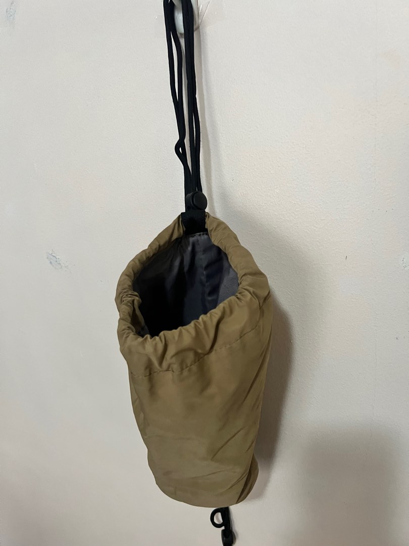 Brown water resistant uniqlo cross body bag, Women's Fashion, Bags ...