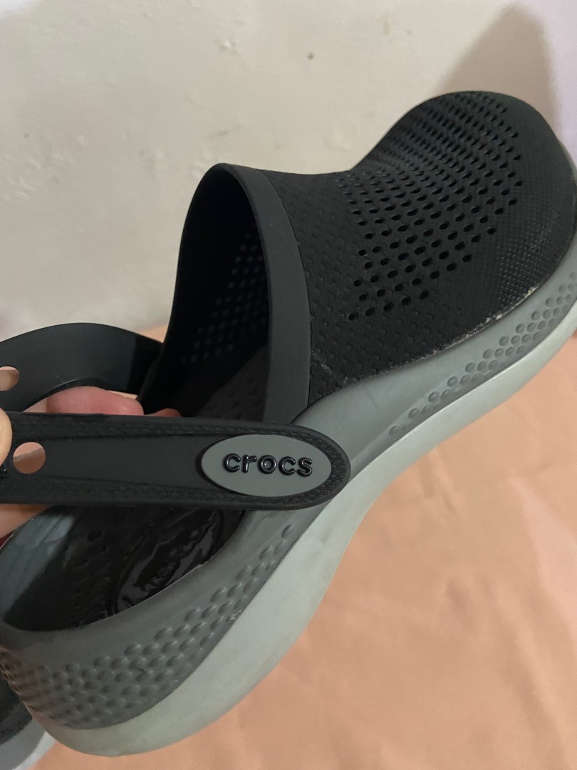 Crocs Lite Ride .. Black and gray color. Slightly used . Not my style ...