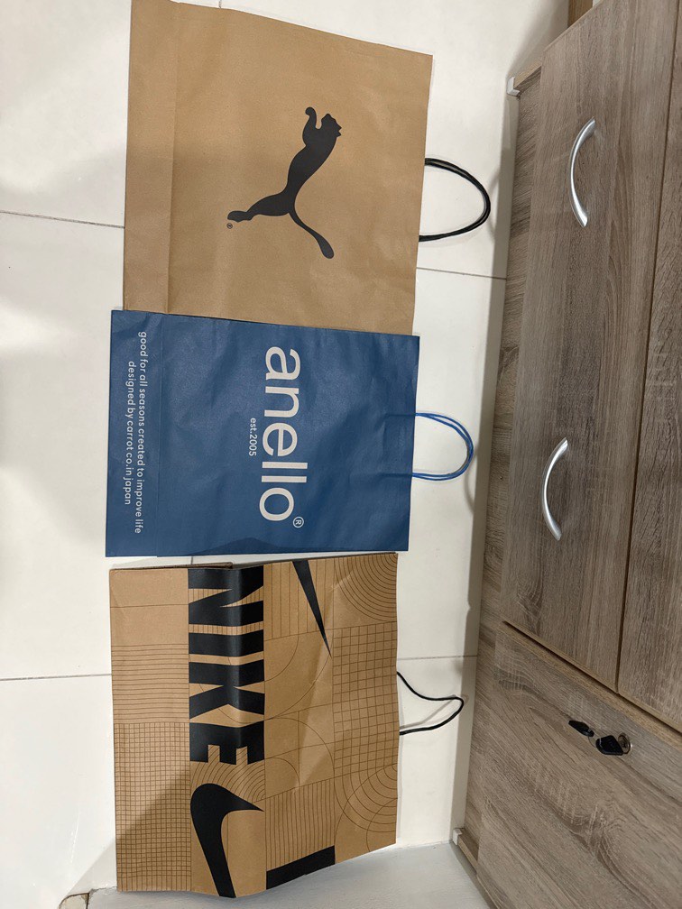 Puma anello Nike paper bags, Women's Fashion, Activewear on Carousell