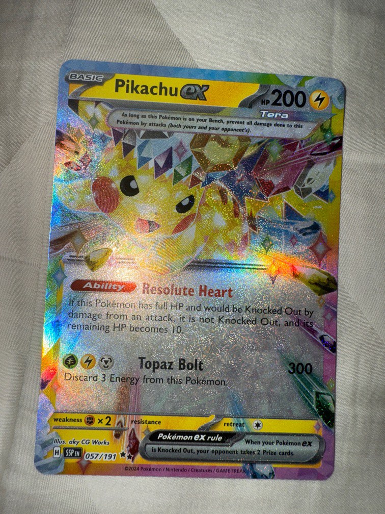 Pikachu ex surging sparks, Hobbies & Toys, Toys & Games on Carousell