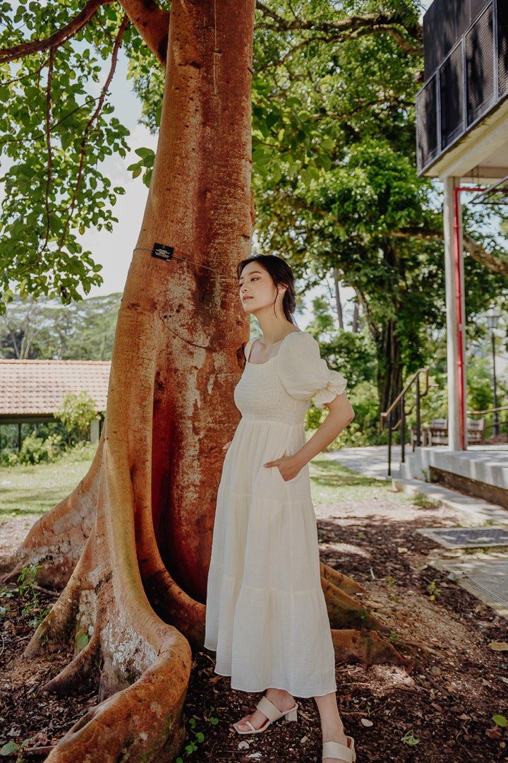 DEVYNN SMOKED PUFF SLEEVE MIDI DRESS on Carousell