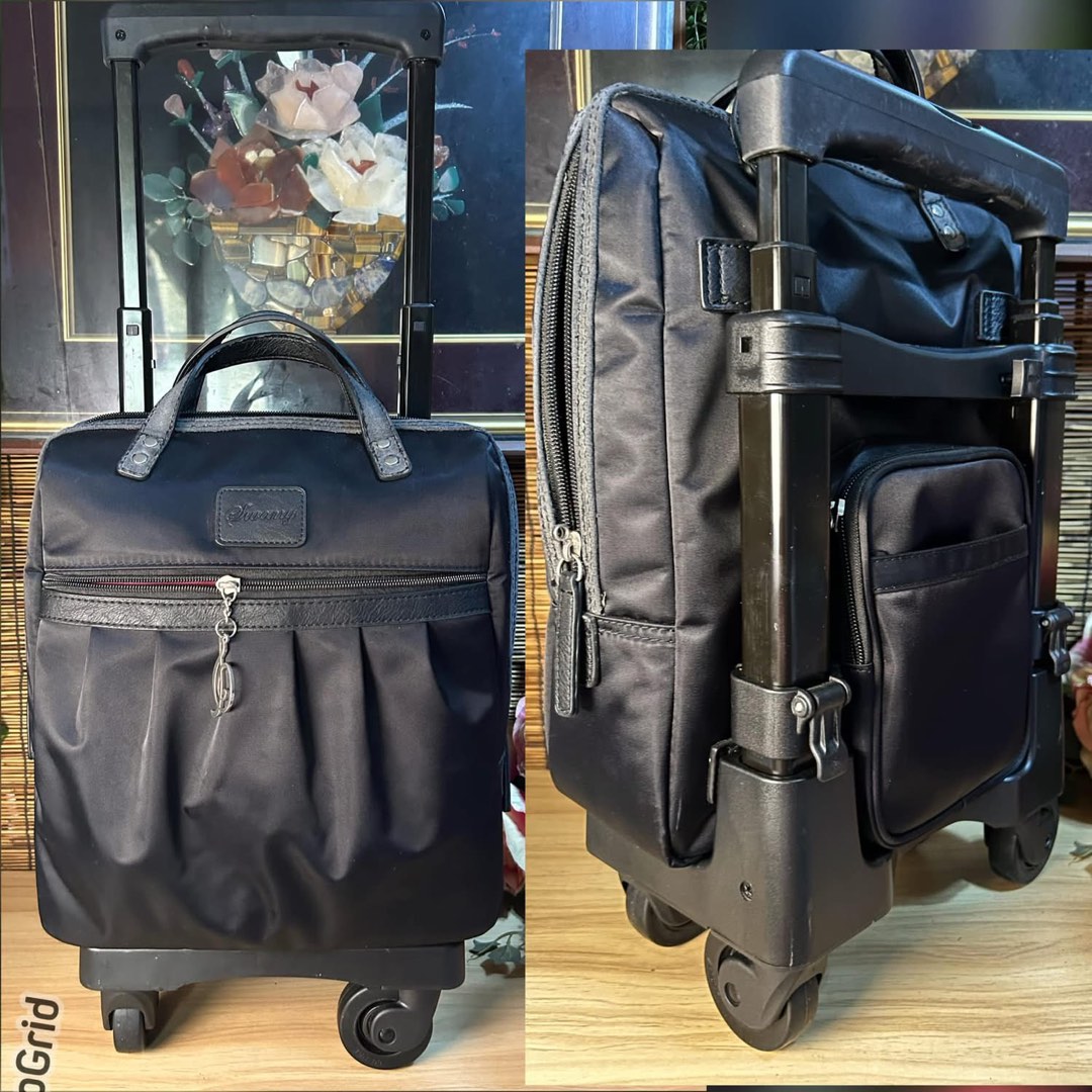 SWANY Soft Carry Crepe. WHEELED BAG. TRAVEL BAG. secure the bag with 4 ...