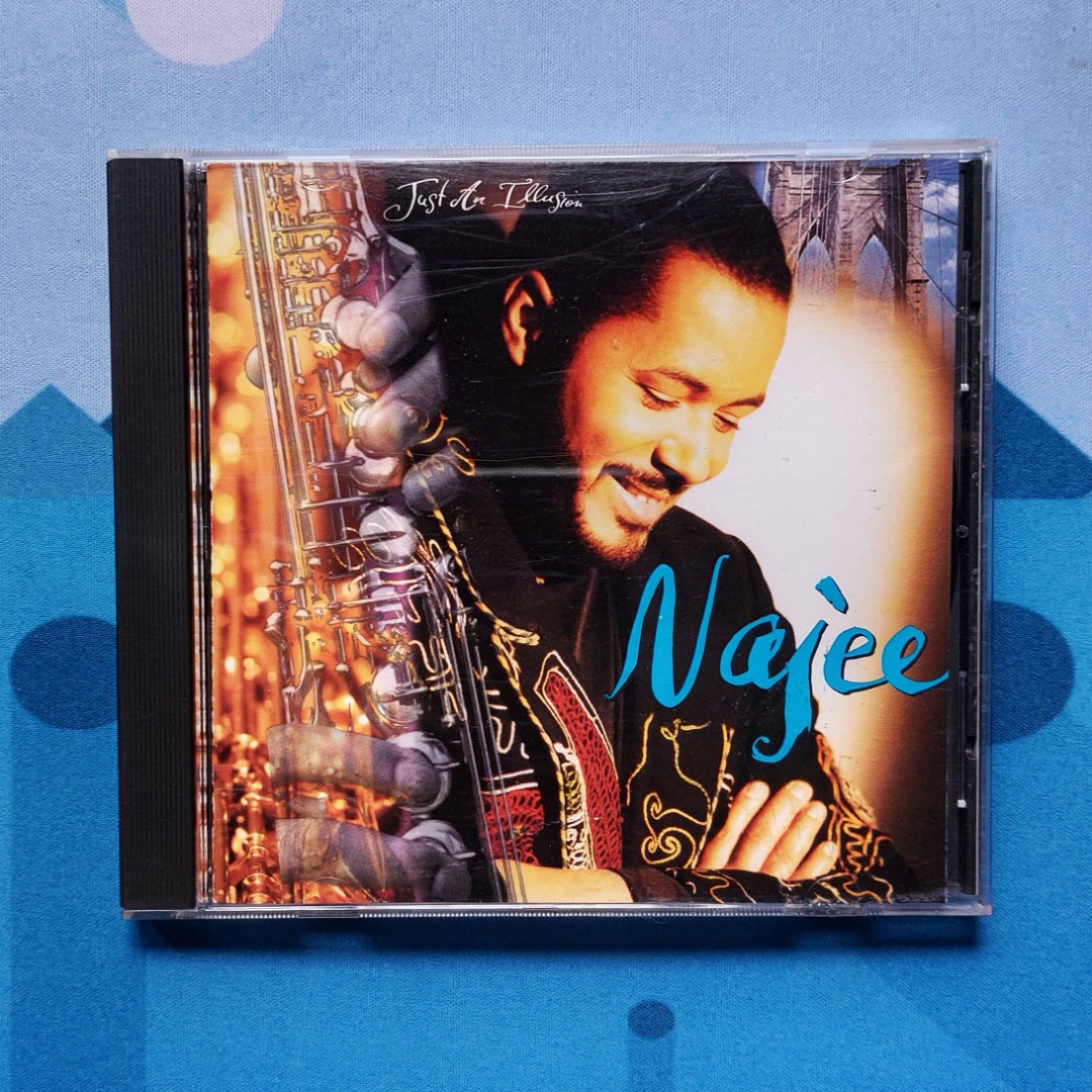 NAJEE Just An Illusion CD, Audio, Portable Audio Accessories on Carousell