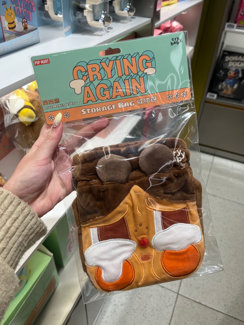 Crying again brown pouch, Hobbies & Toys, Collectibles & Memorabilia ...
