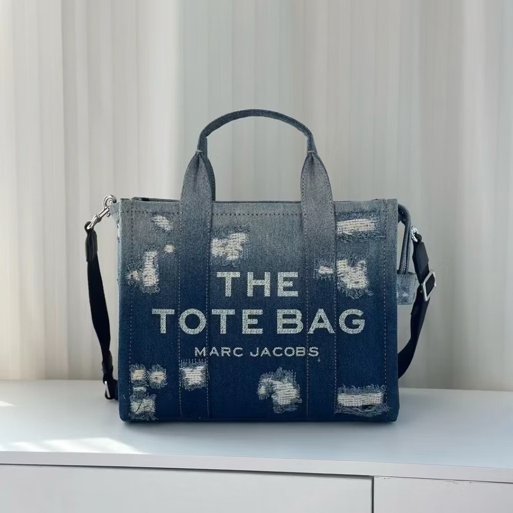 Marc Jacobs The Tote Bag Denim Ripped, Luxury, Bags & Wallets on Carousell