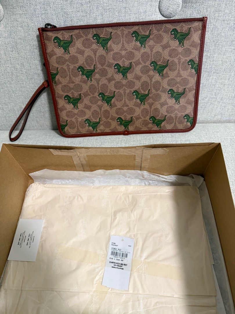 Coach Clutch X Dino, Women's Fashion, Bags & Wallets, Clutches on Carousell