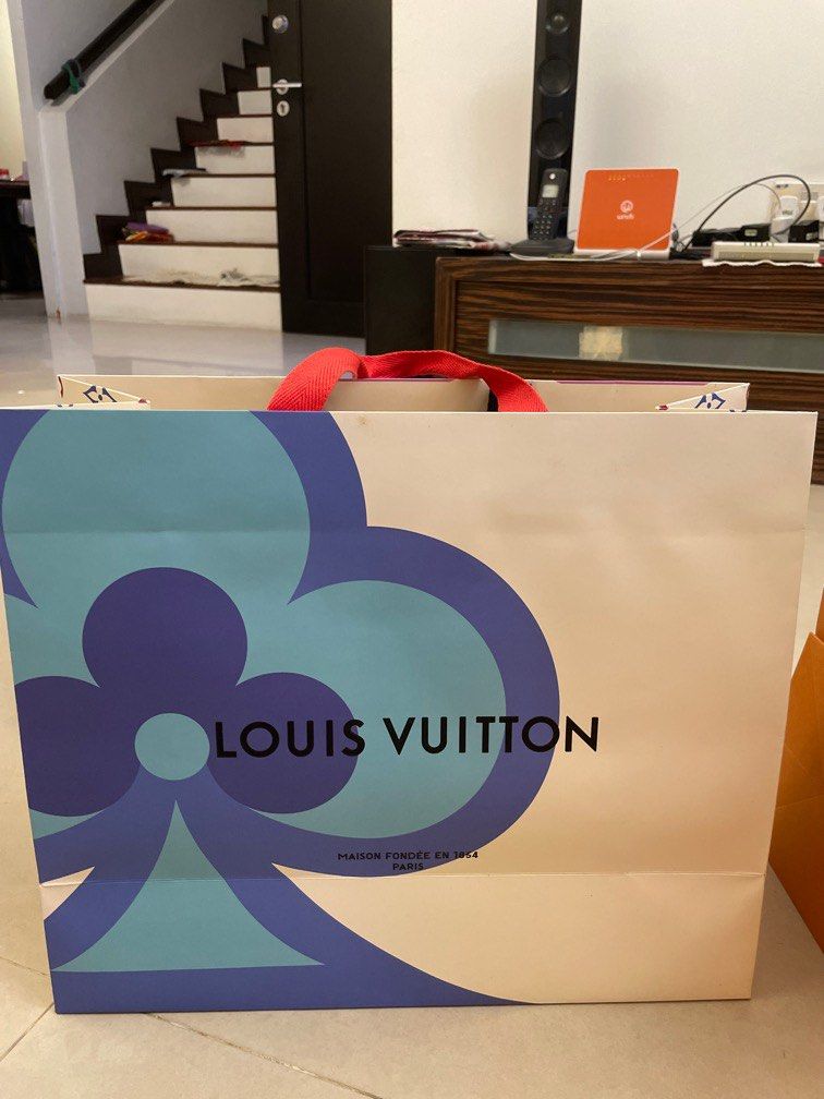 LV paper bag, Luxury, Bags & Wallets on Carousell