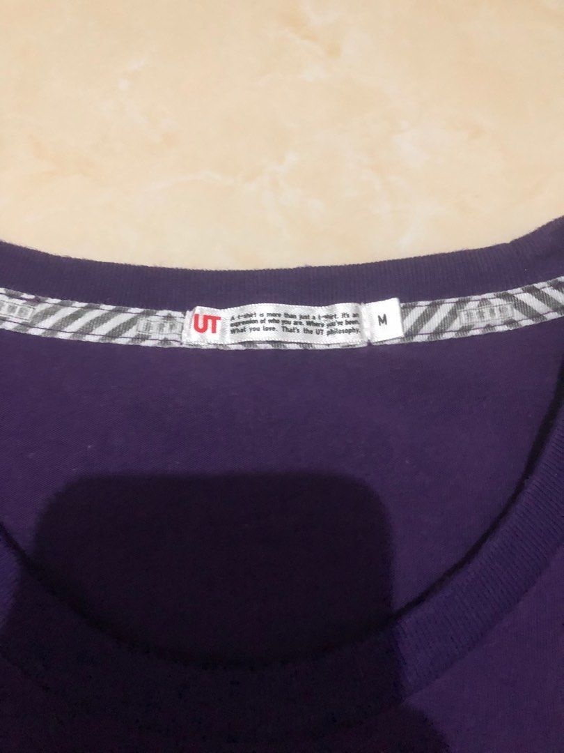 Uniqlo UT x Evangelion Kaos Uniqlo ungu bergambar Eva-01 dari anime ...