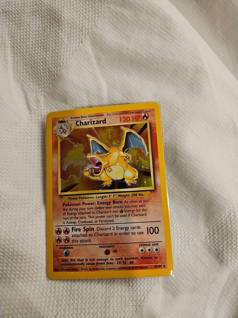 Base Set Unlimited Charizard, Hobbies & Toys, Toys & Games on Carousell