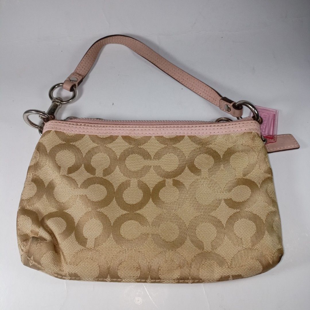 Coach original woman Pouch, Fesyen Wanita, Tas & Dompet di Carousell