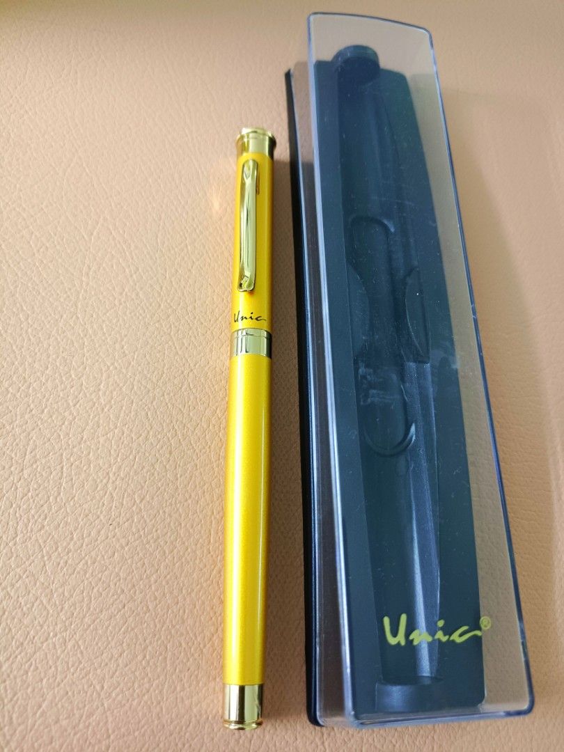 UNIC Golden Premium Black Gel Pen 0.7mm, Hobbies & Toys, Stationery ...