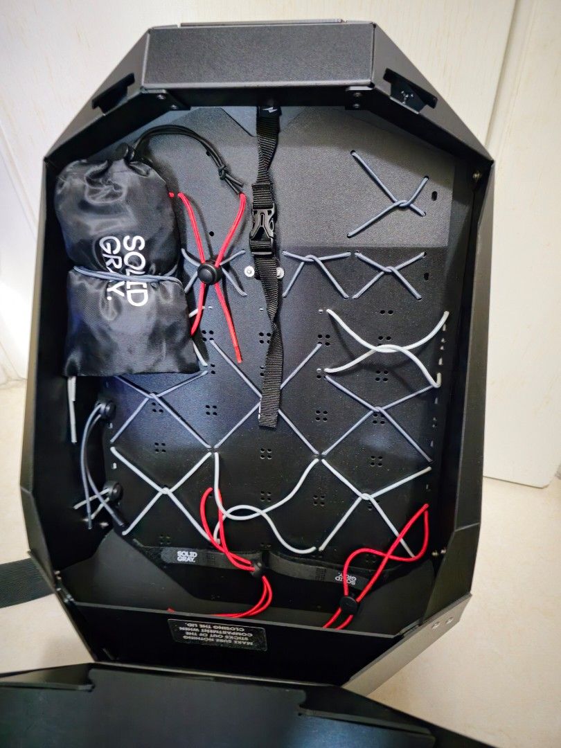 solid gray hard shell backpack