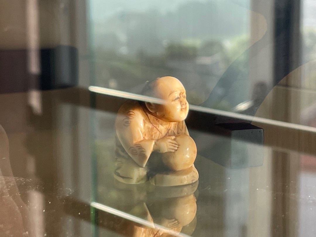 Antique netsuke of a monk holding a futon, Hobbies & Toys, Memorabilia ...