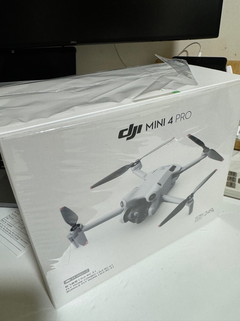 DJI Mini 4 pro box, Photography, Drones on Carousell