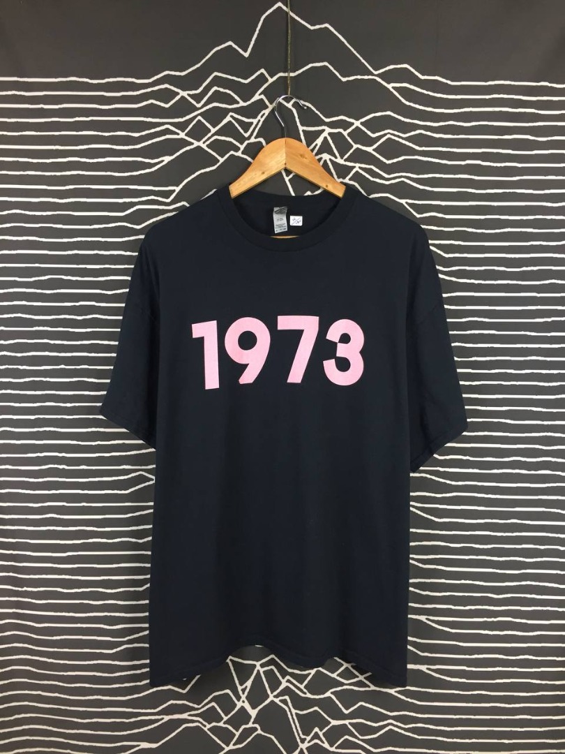 Gildan Heavy Cotton 1973 Logo Tee, Men's Fashion, Tops & Sets, Tshirts ...