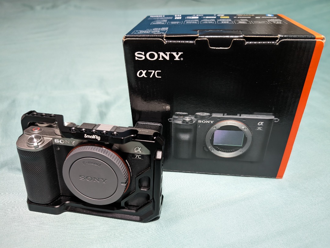 Sony A7C body only + SmallRig Cage, Photography, Cameras on Carousell