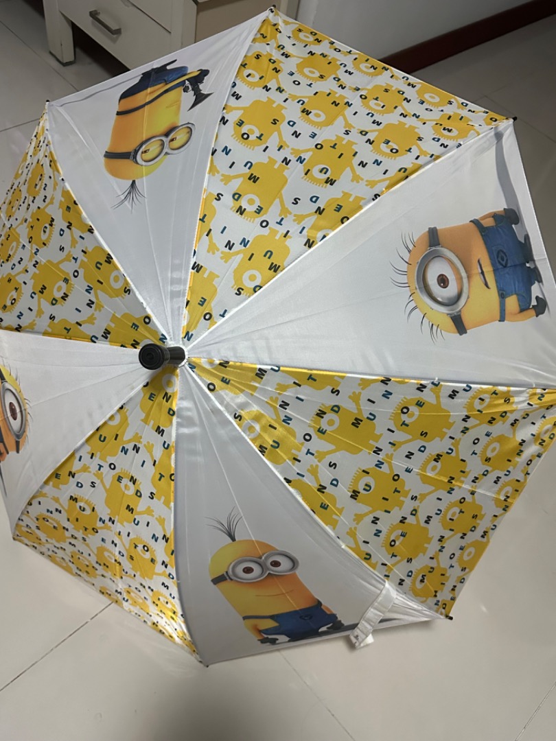 Minion stick umbrella, Hobbies & Toys, Travel, Umbrellas on Carousell