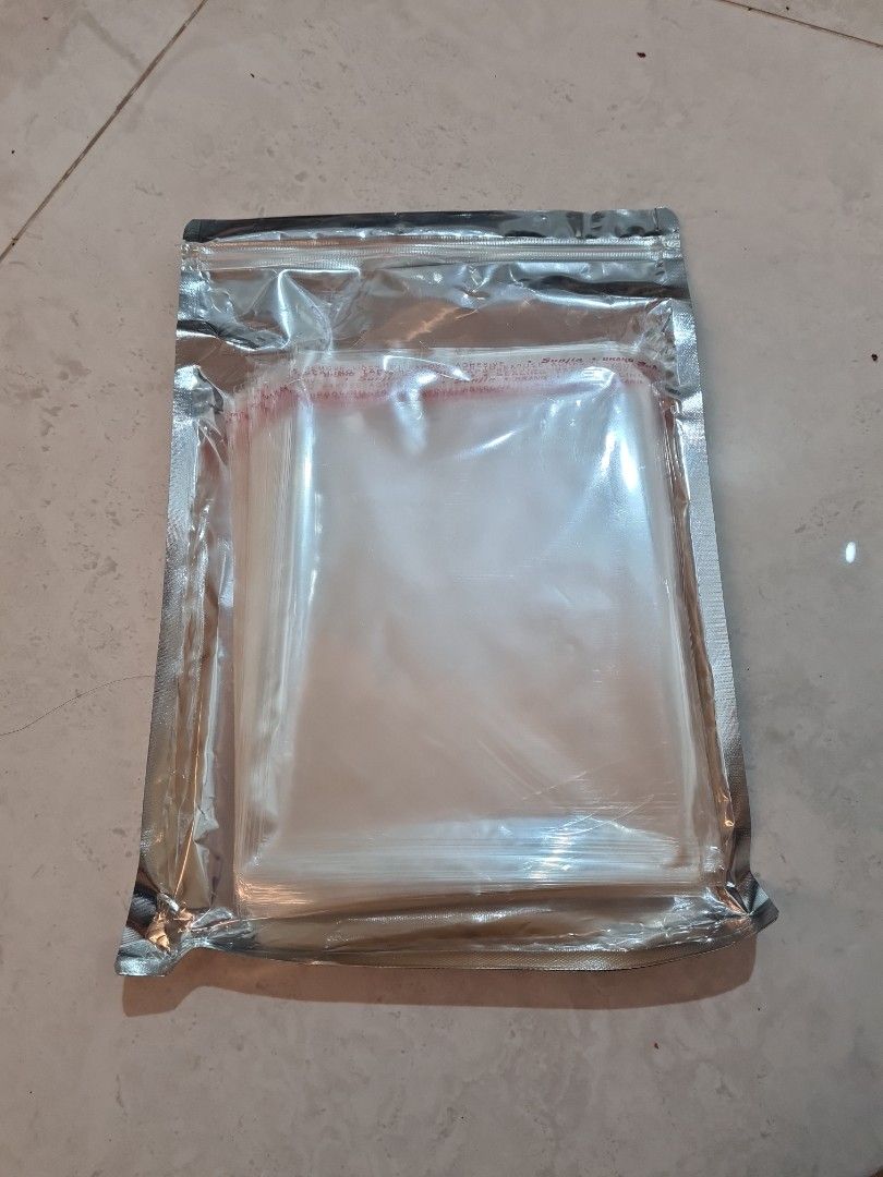 (50pcs/set) 15cm x 20cm plastic sleeves with adhesive, Hobbies & Toys ...